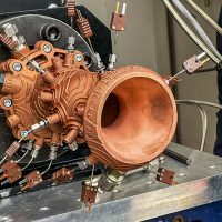 LEAP 71 hot fires additively manufactured rocket engine designed without human intervention